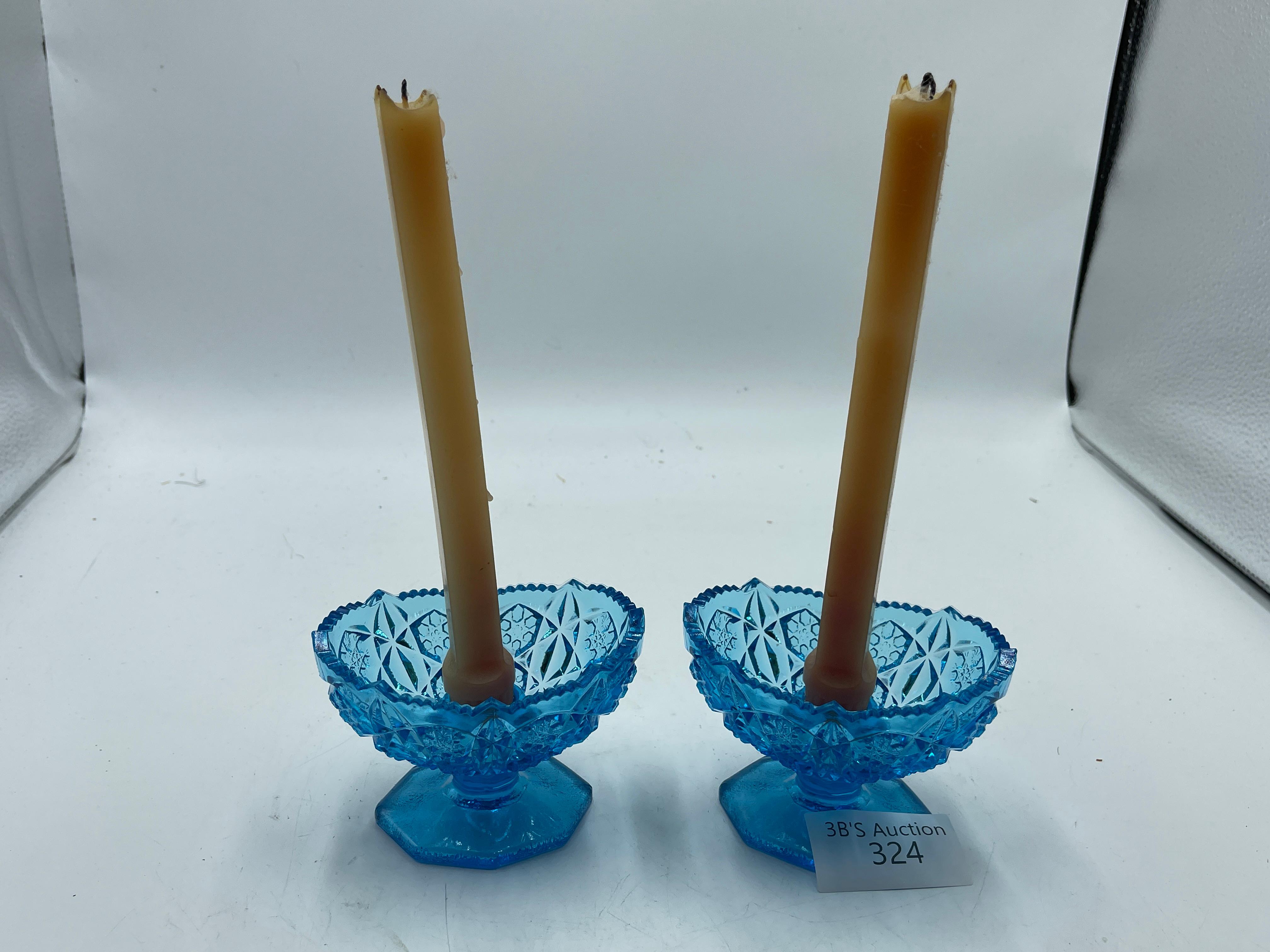 Lot - Two Kemple Wheaton Pressed glass candle holders