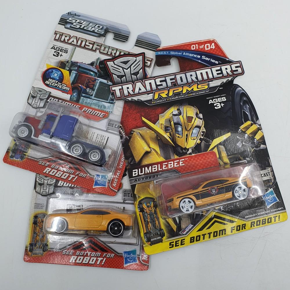 At Auction: TRANSFORMERS RPMS Diecast cars/truck Bumblebee Optimus Prime.