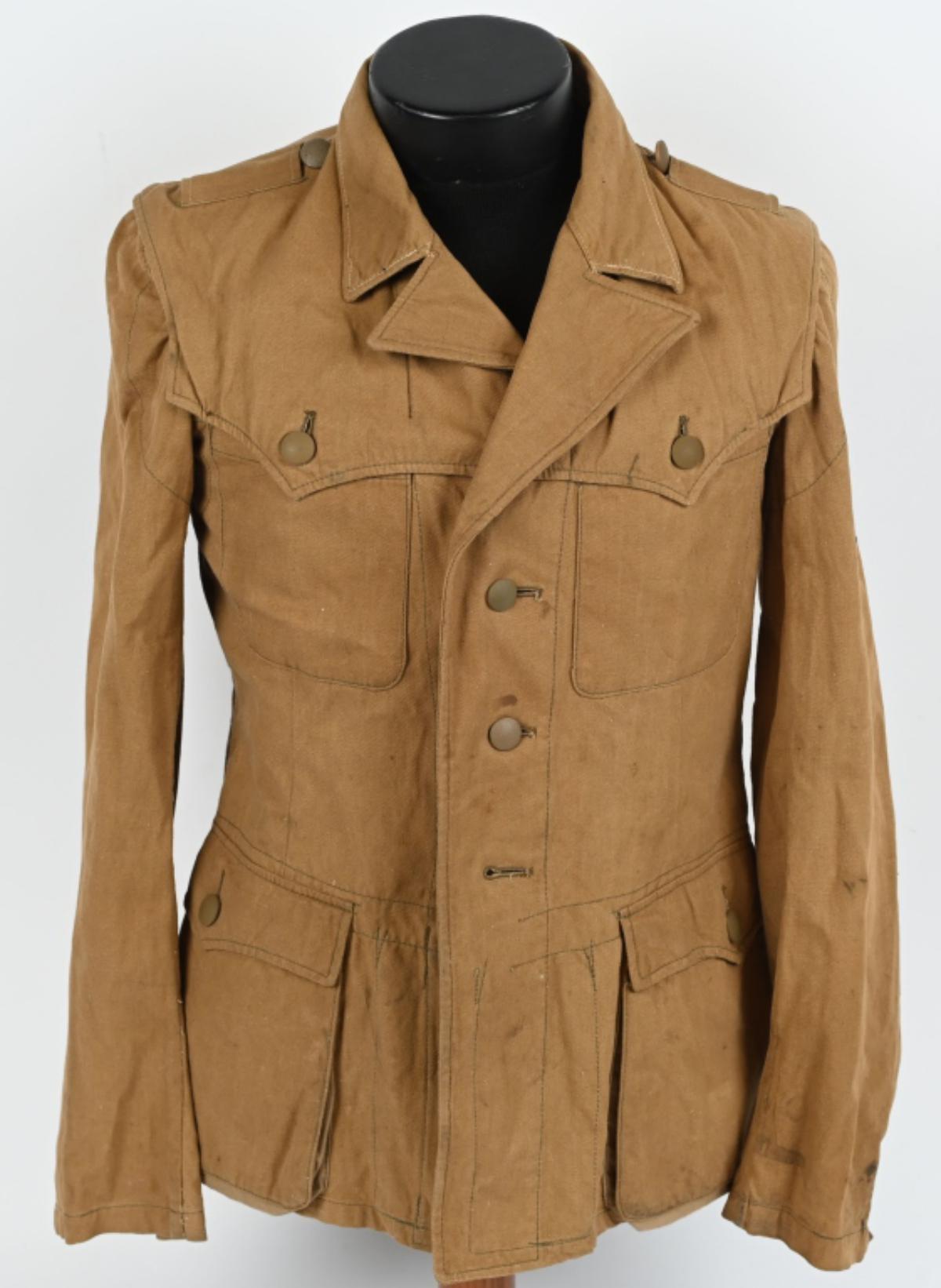 At Auction: WWII NAZI WAFFEN SS TROPICAL SERVICE TUNIC WW2