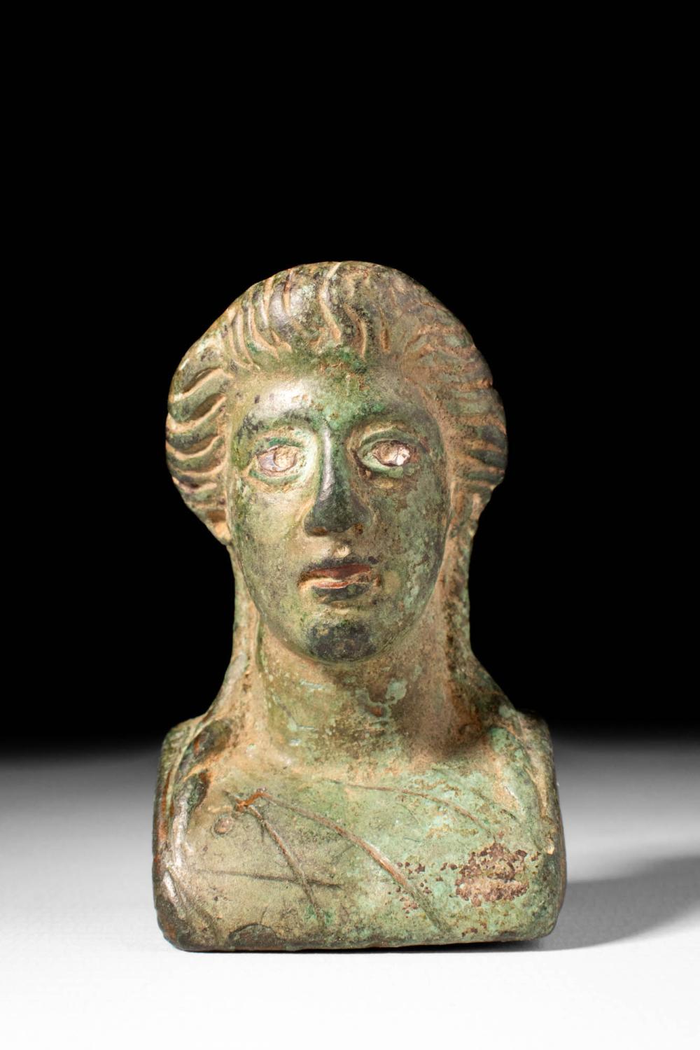 At Auction: ROMAN BRONZE HERM OF VENUS WITH SILVER INLAID EYES