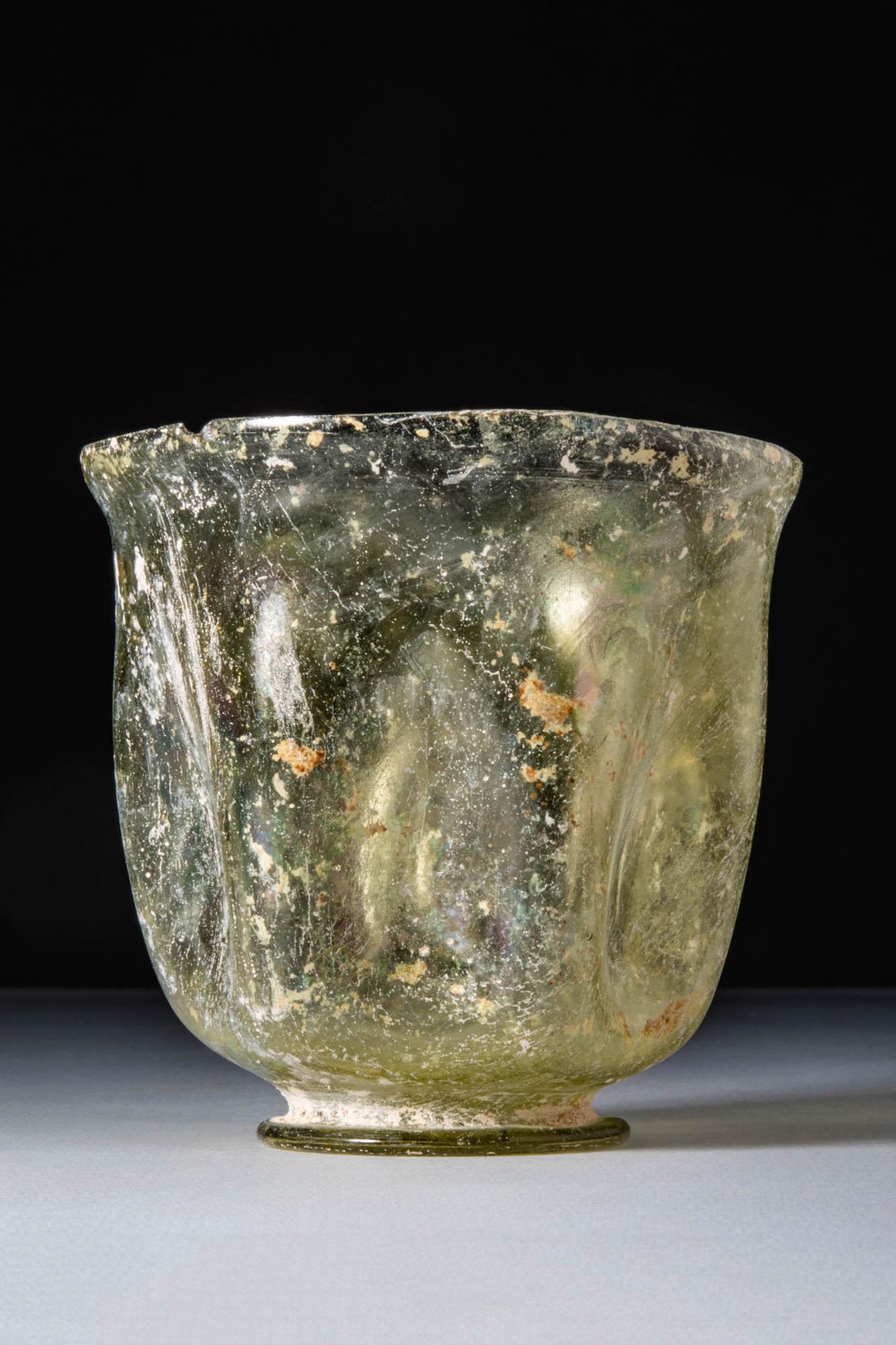 At Auction: ROMAN GREEN GLASS BEAKER