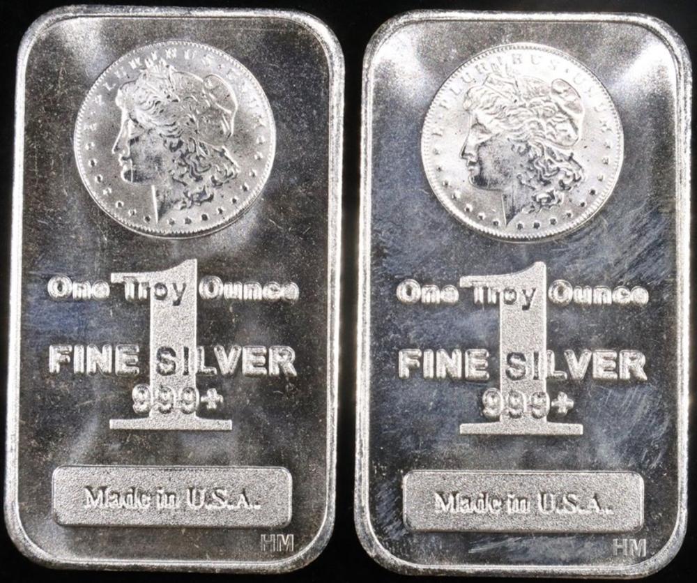 At Auction: (2) 1 OZ .999 SILVER MORGAN BARS