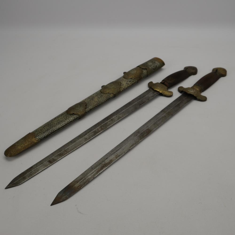 At Auction: Chinese double sword (shuang jian)