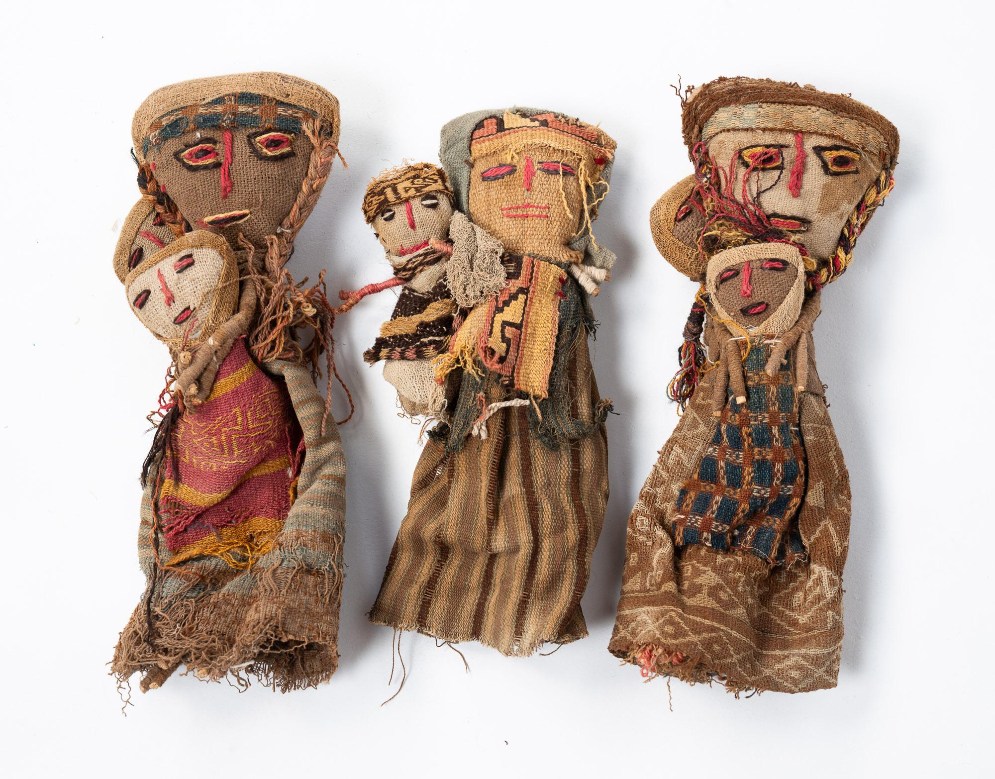 Lot - THREE PERUVIAN CHANCAY CLOTH BURIAL DOLLS.