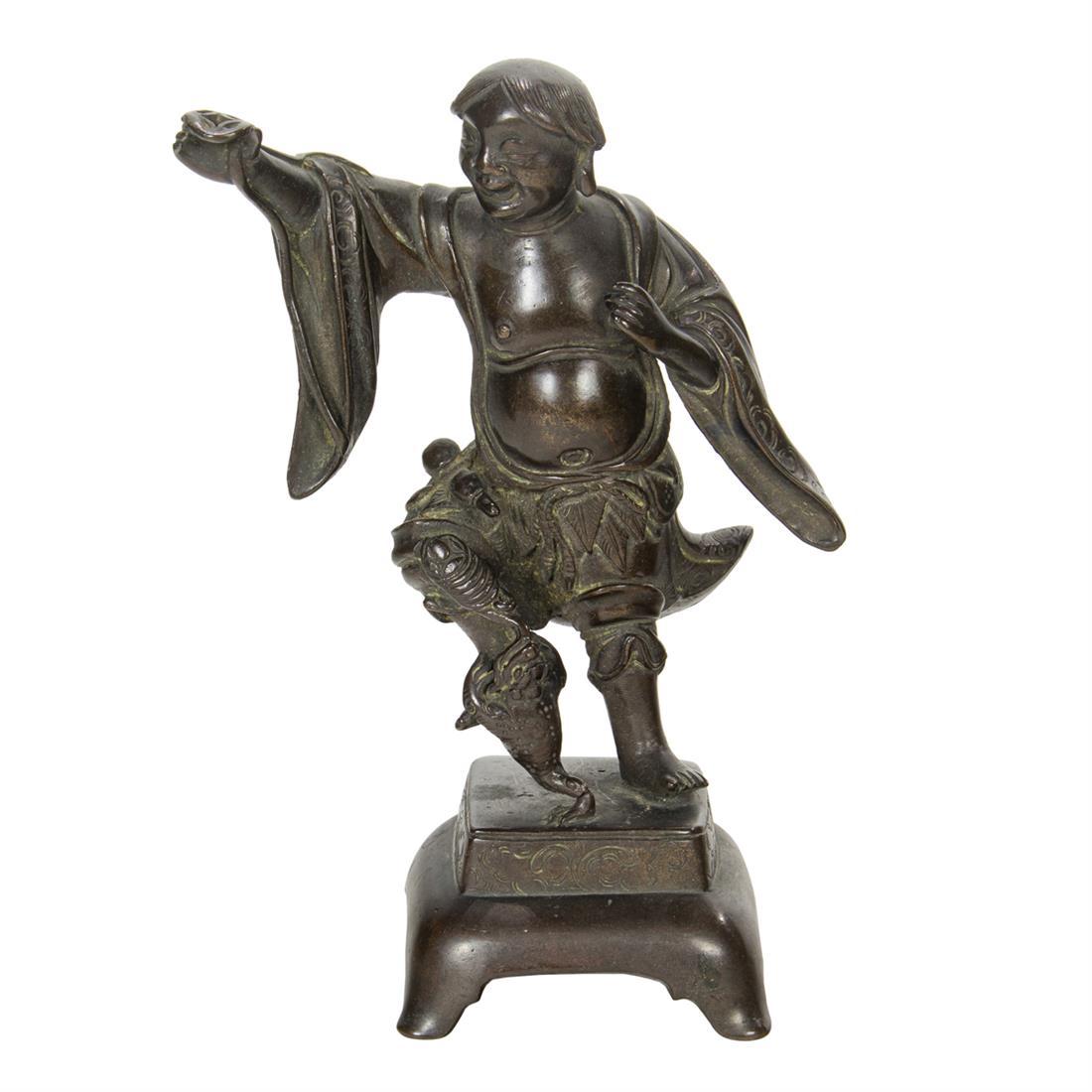 At Auction: A Chinese bronze figure of Liu Hai