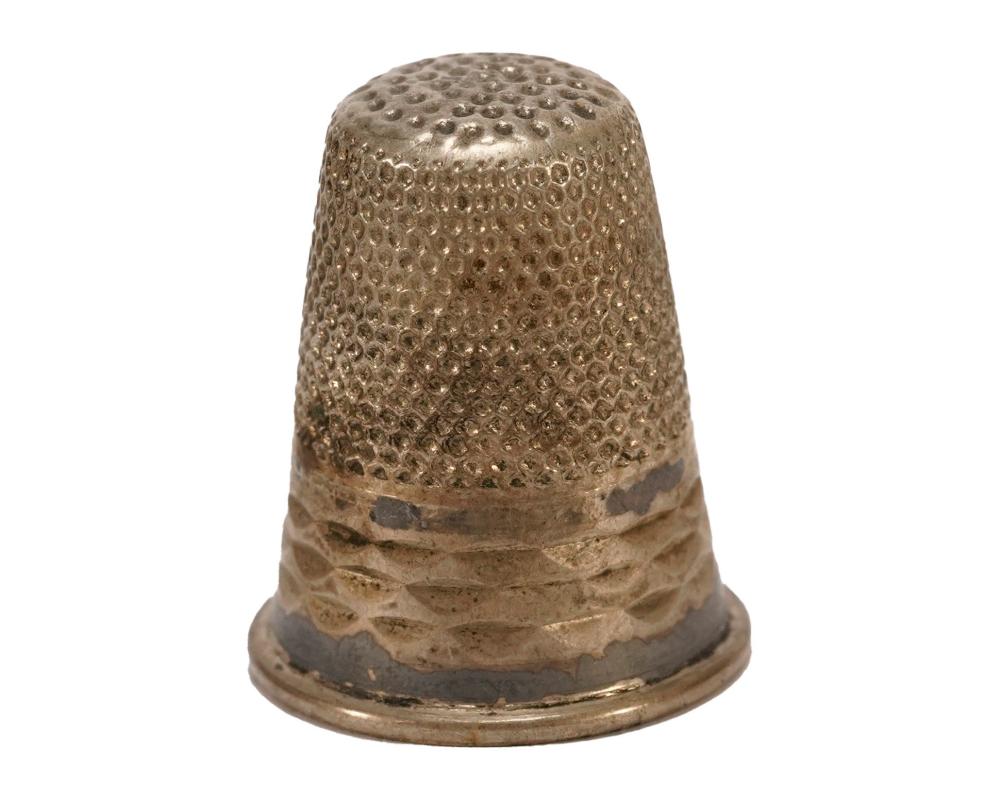 Sold at Auction: Antique Sterling Silver Round top Thimble