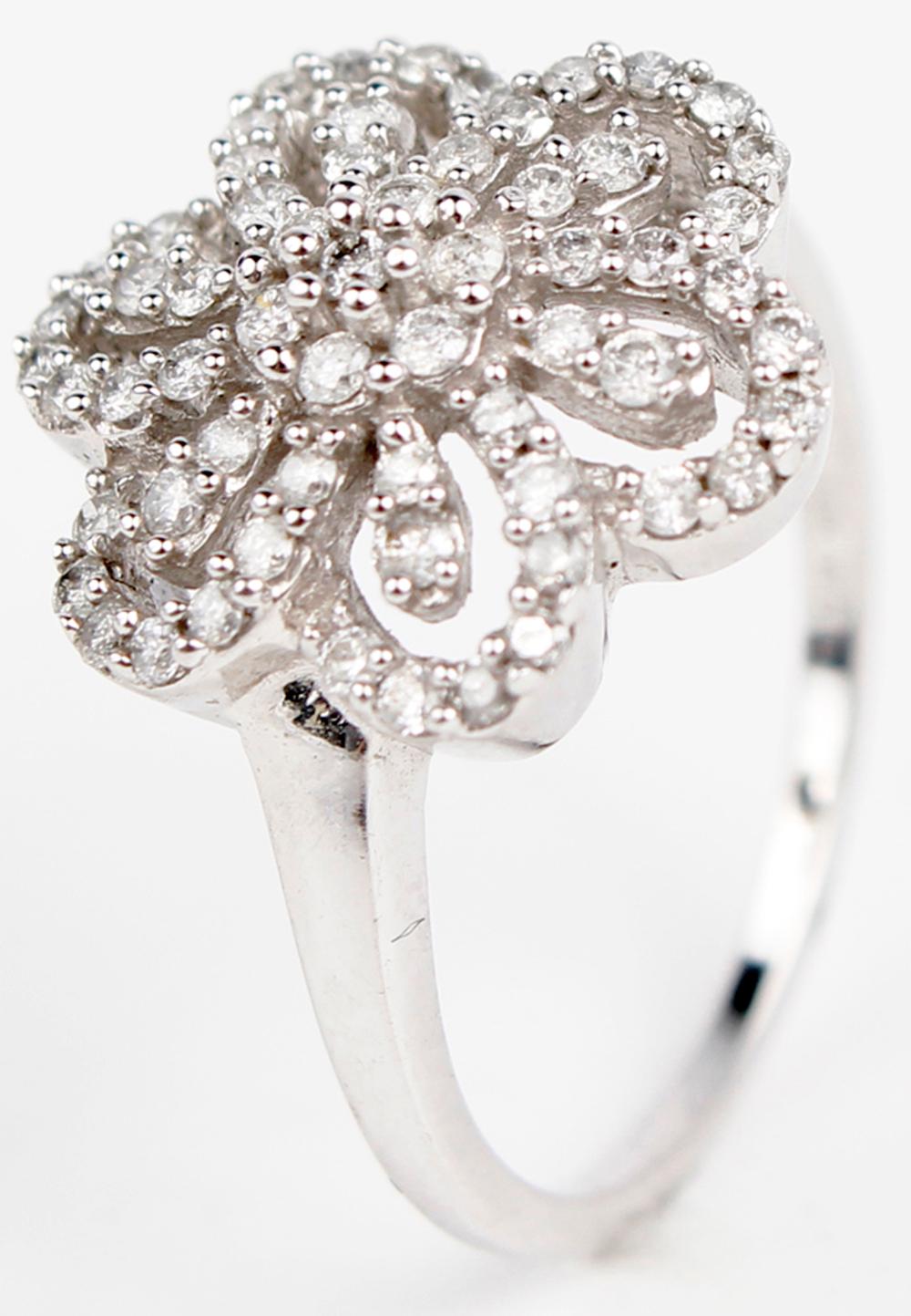 Lot - LADIES 10K WHITE GOLD DIAMOND FLOWER RING