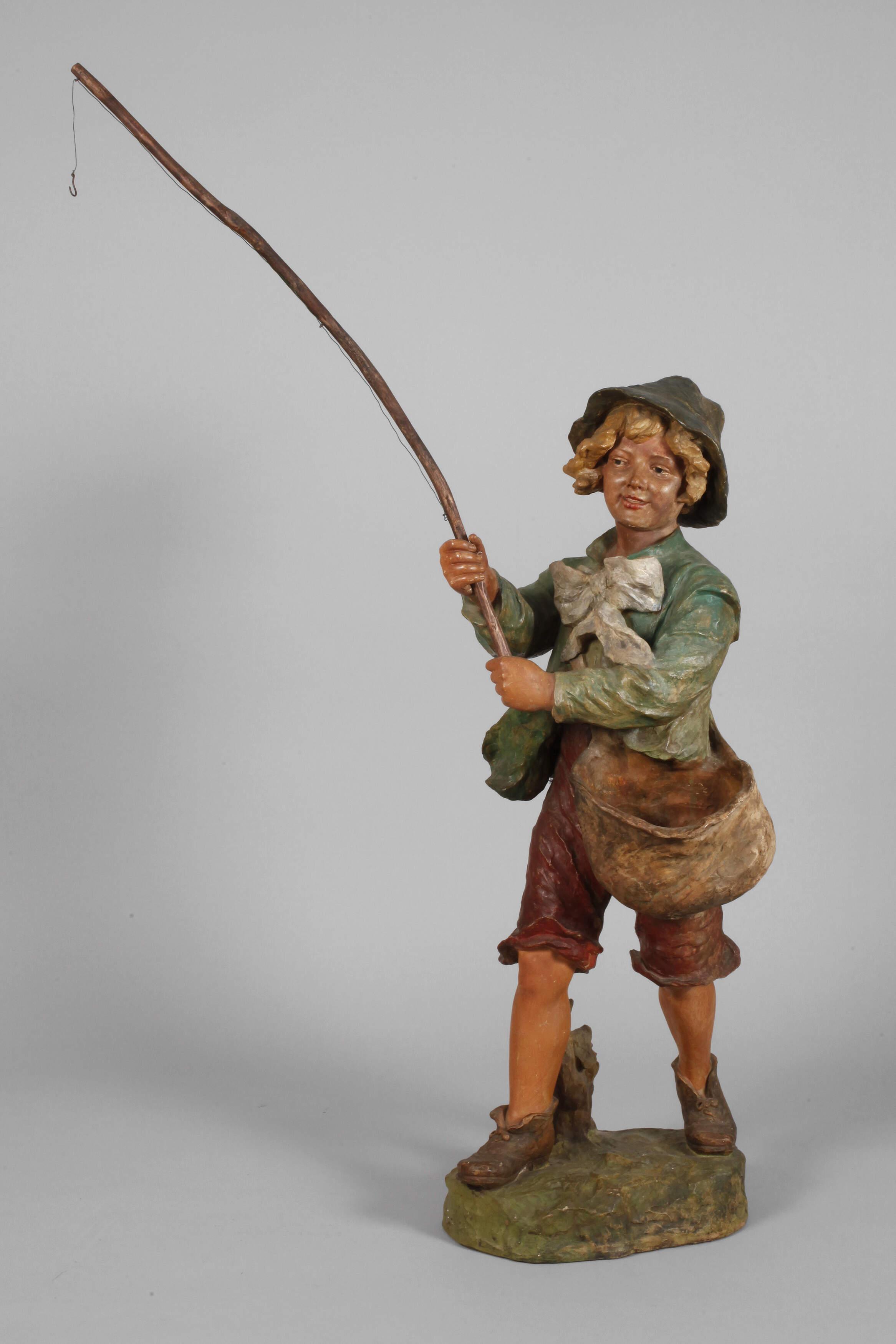At Auction: Goldscheider Wien Knabe mit Rute