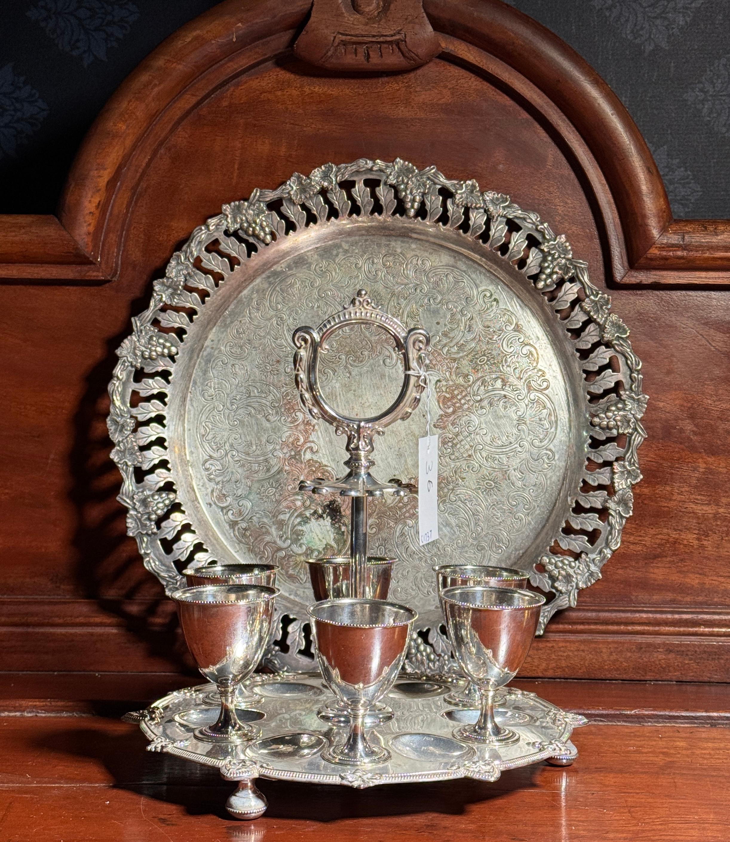 At Auction: Silver plate egg cup set with spoon holders + pierced rim ...