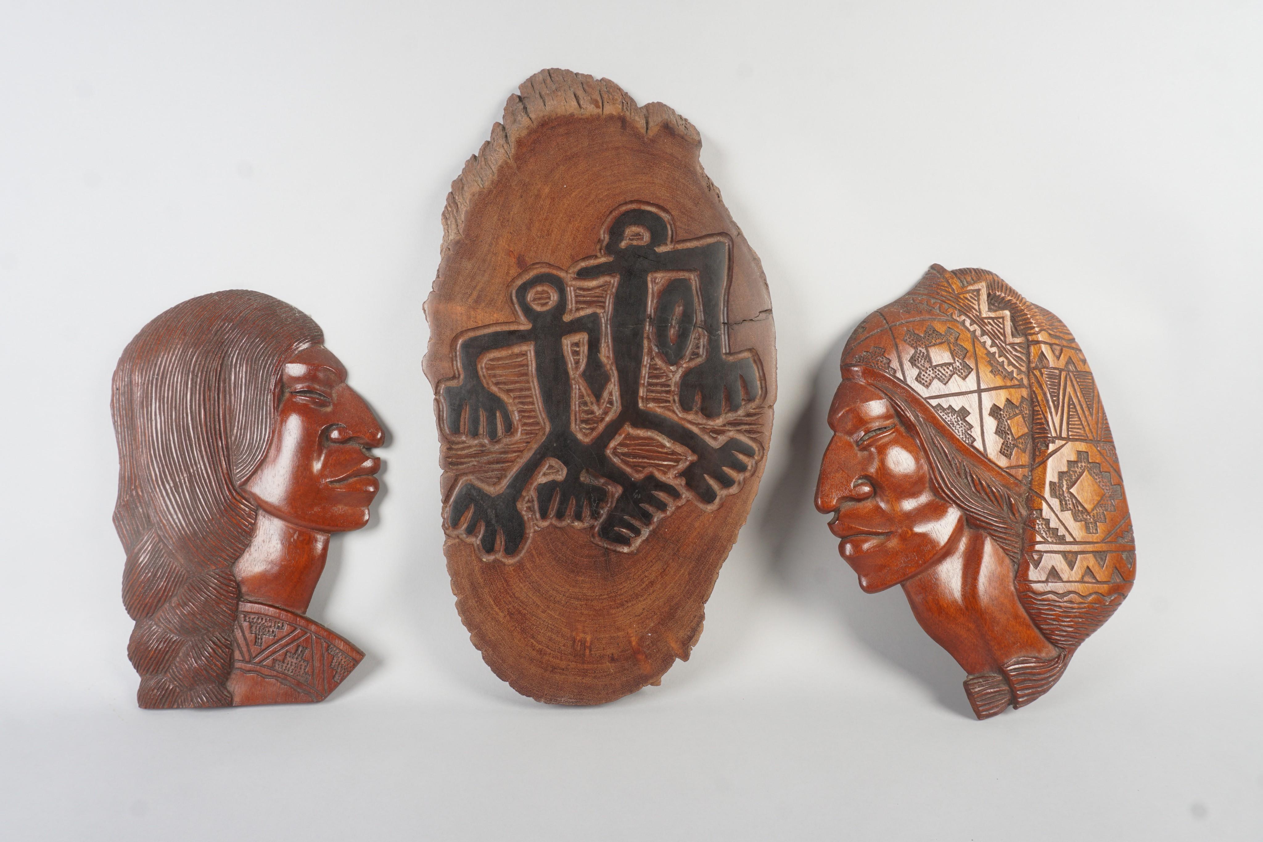 Lot - THREE CARVED WOOD WALL HANGINGS FROM GUAM