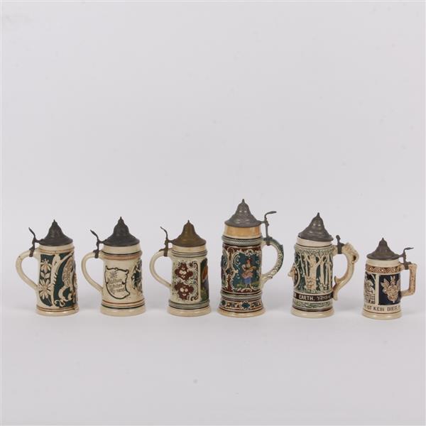 Lot - Six German stoneware steins.